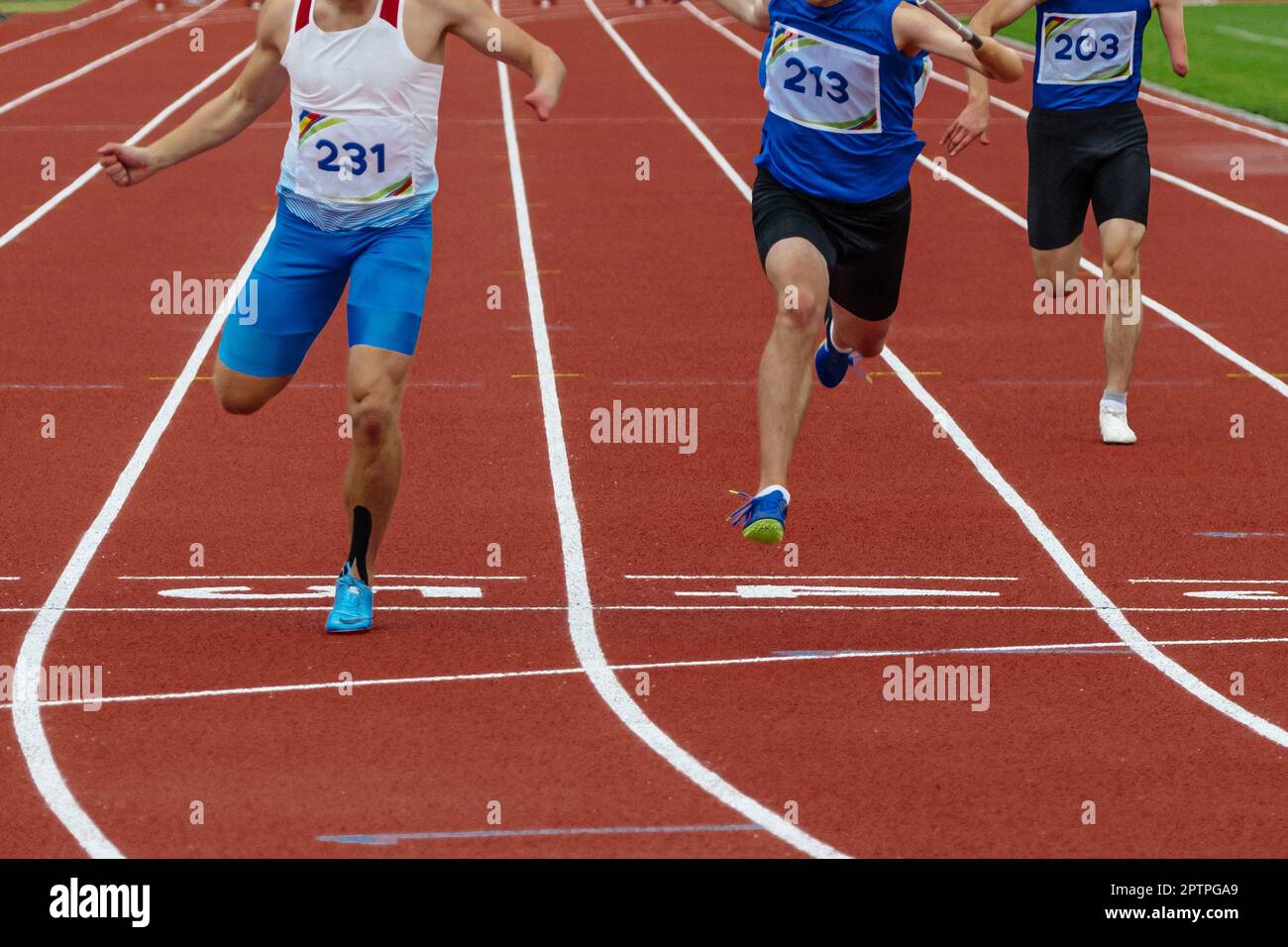 group runner para-athlete on limb deficiency running finish line track ...