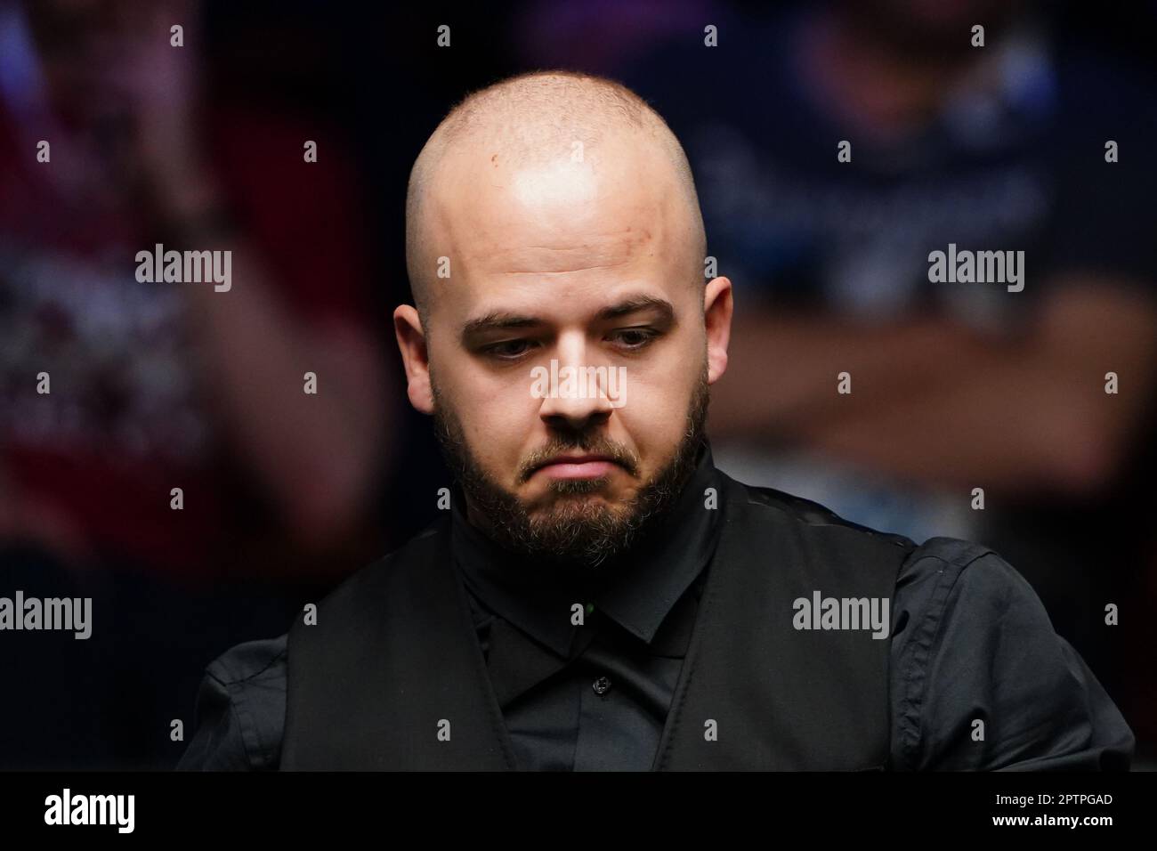Luca Brecel in action against Si Jiahui (not pictured) on day fourteen ...