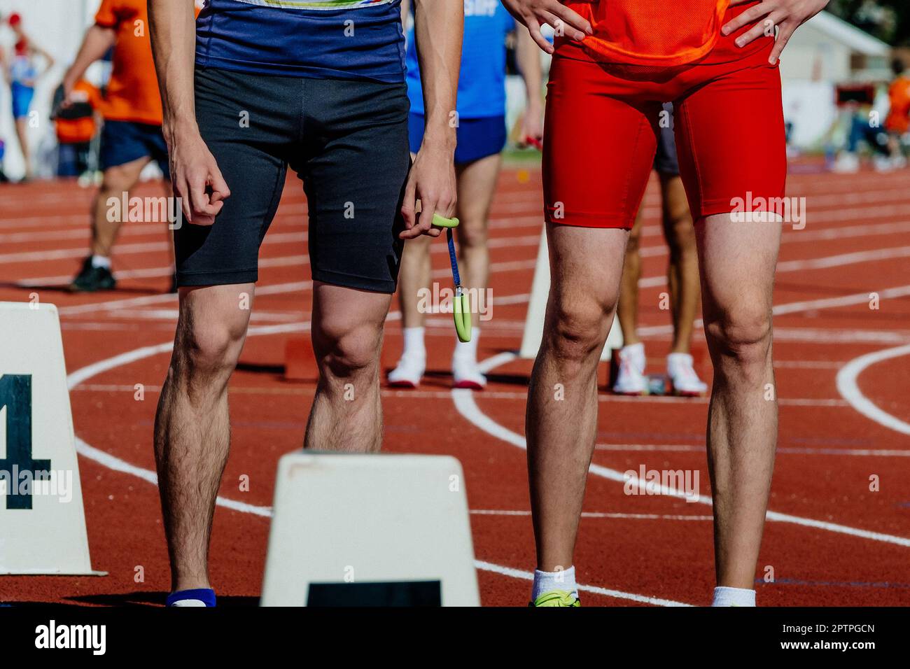blind para athlete runner with guide in starting line sprint race, in ...