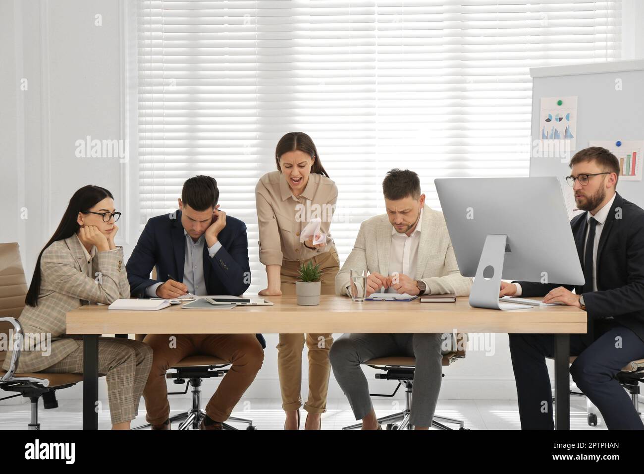 Boss screaming at employees on meeting in office. Toxic work ...