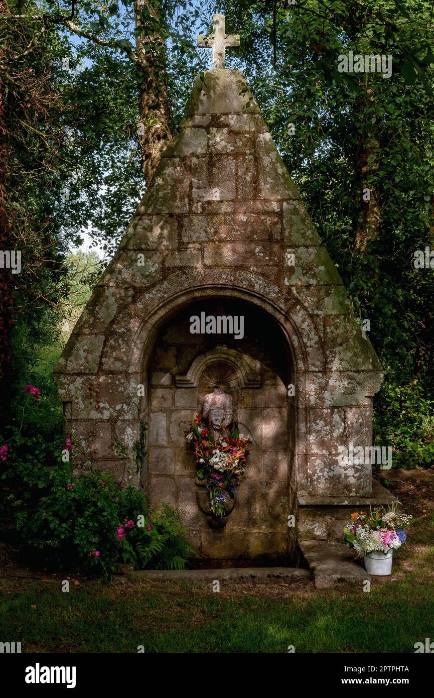 Shrine with headless statue of female saint, built in the 1500s AD, at ...