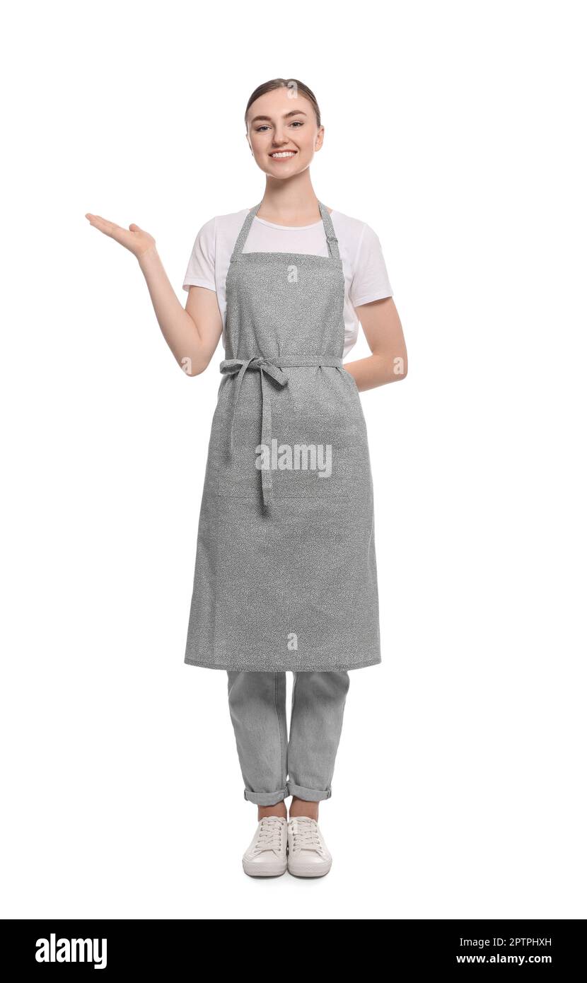 Beautiful young woman in clean apron on white background Stock Photo ...