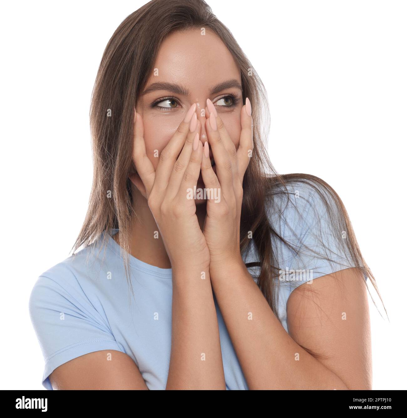 Embarrassed woman covering face with hands on white background Stock Photo - Alamy