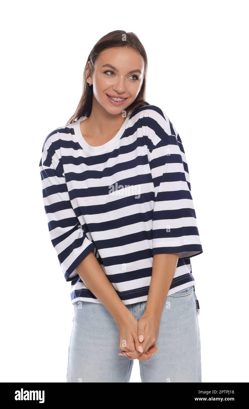 Embarrassed woman in shirt on white background Stock Photo - Alamy