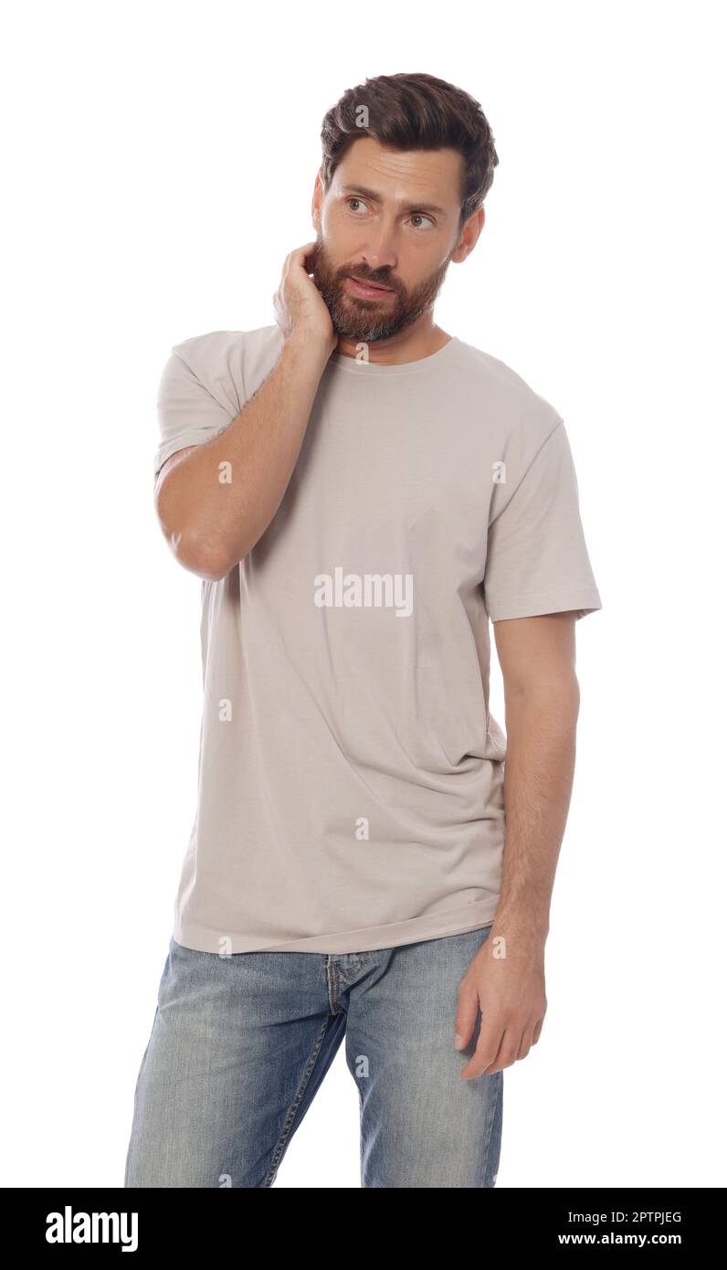 Embarrassed man in shirt on white background Stock Photo - Alamy