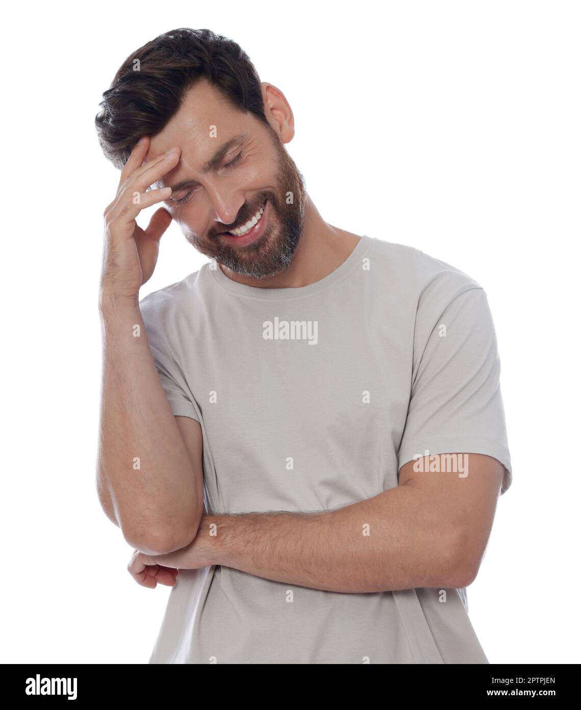 Embarrassed man covering face with hand on white background Stock Photo ...