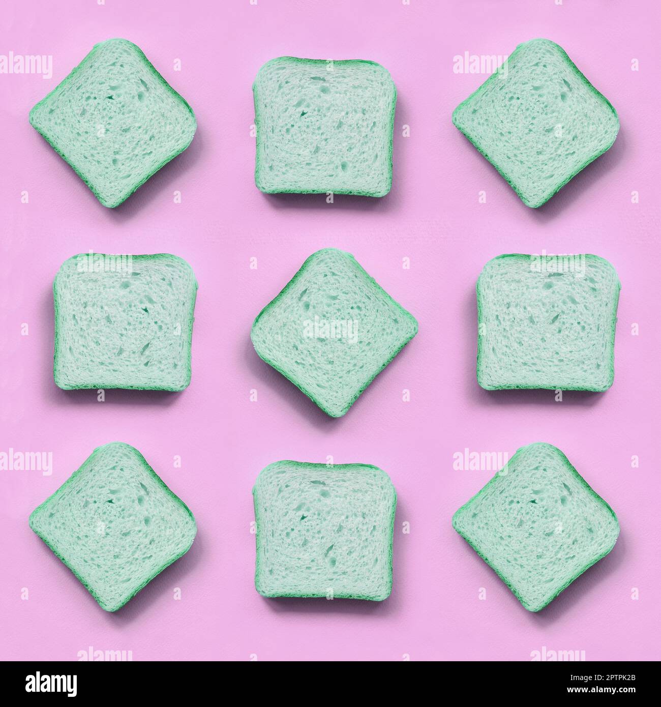 A few pieces of green bread lies on texture background of fashion ...