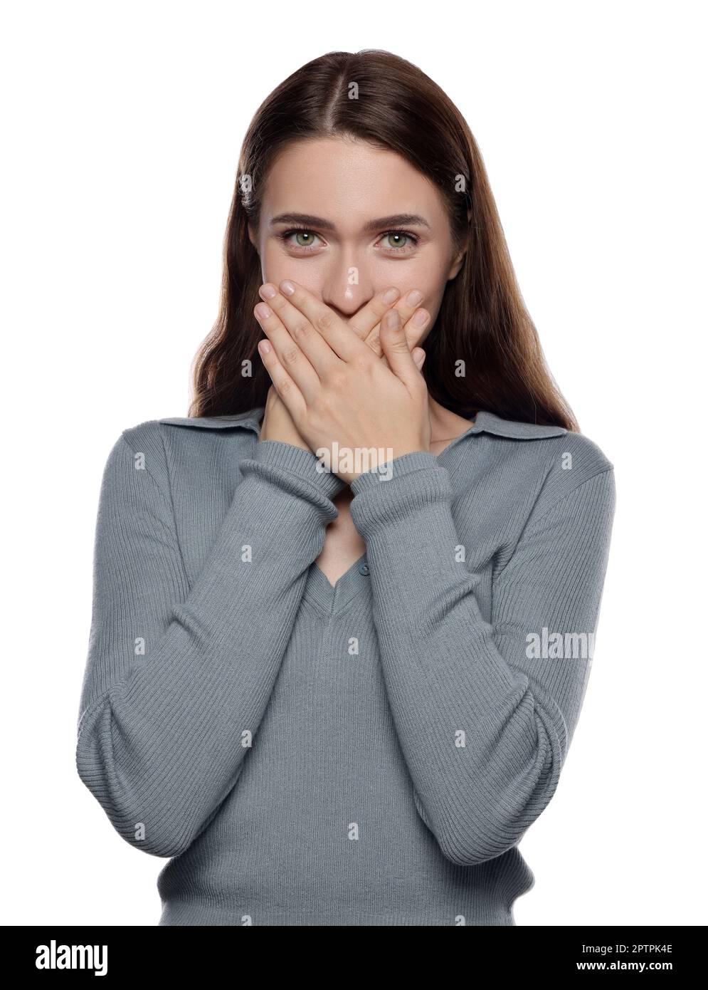 Embarrassed young woman covering face with hands on white background Stock Photo - Alamy