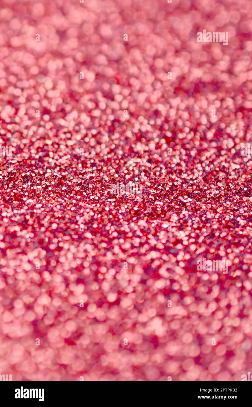 Coral red decorative sequins. Background image with shiny bokeh lights ...