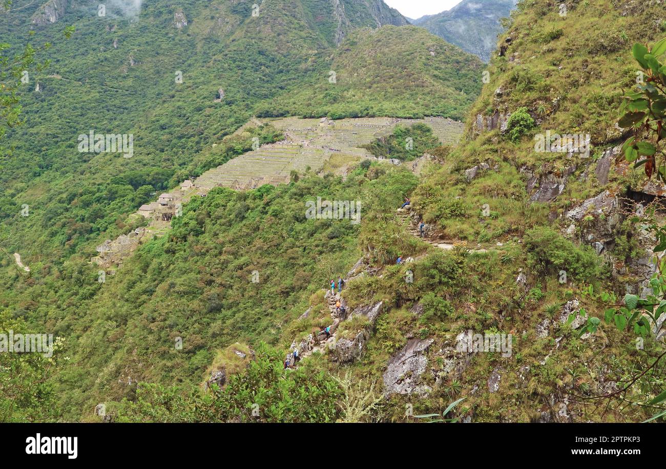 Large Group of Visitors Climbing to the Condor Shaped Machu Picchu ...