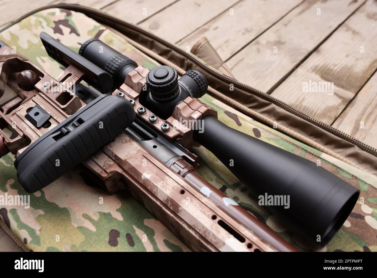 Closeup view of modern powerful sniper rifle with telescopic sight on ...