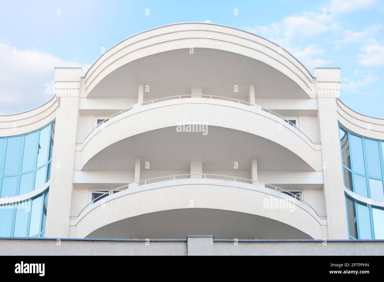 Exterior of beautiful residential building with balconies, low angle ...