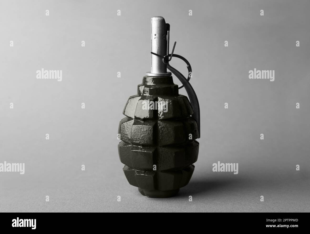 Hand grenade on grey background, closeup. Explosive weapon Stock Photo ...