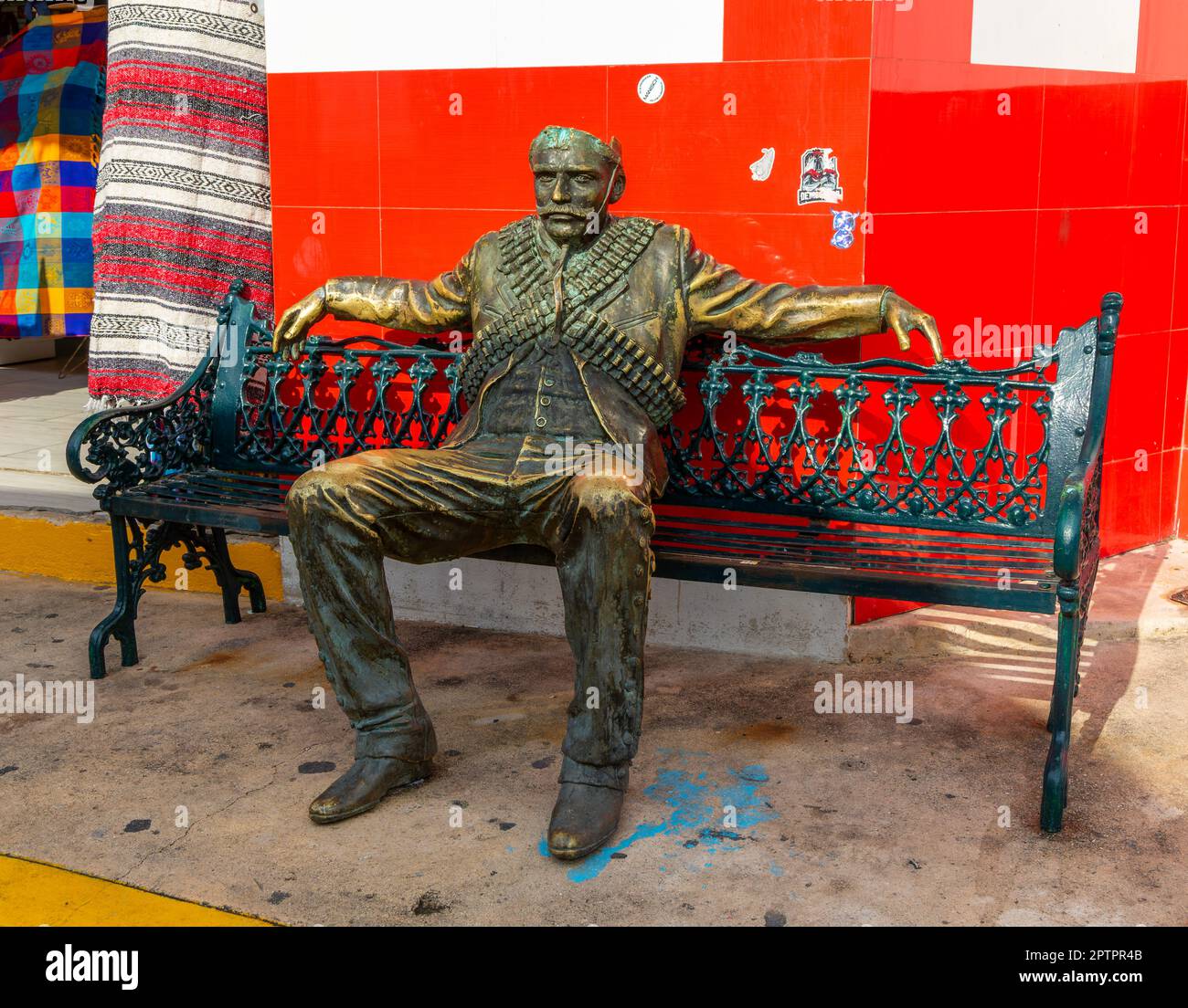 Sculpture of seated Mexican bandit, Isla Mujeres, Caribbean Coast ...