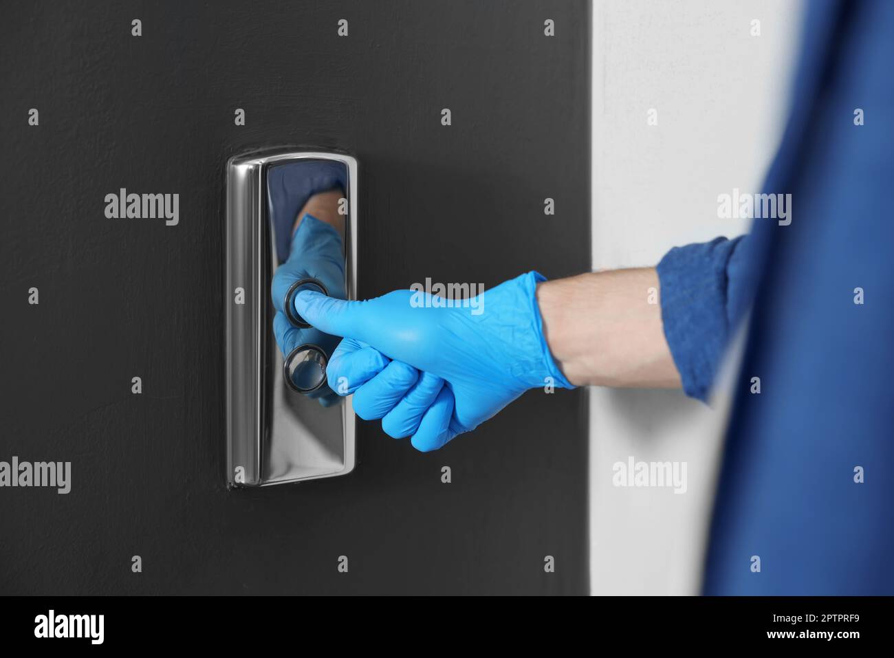 Pressing button in elevator hi-res stock photography and images - Alamy