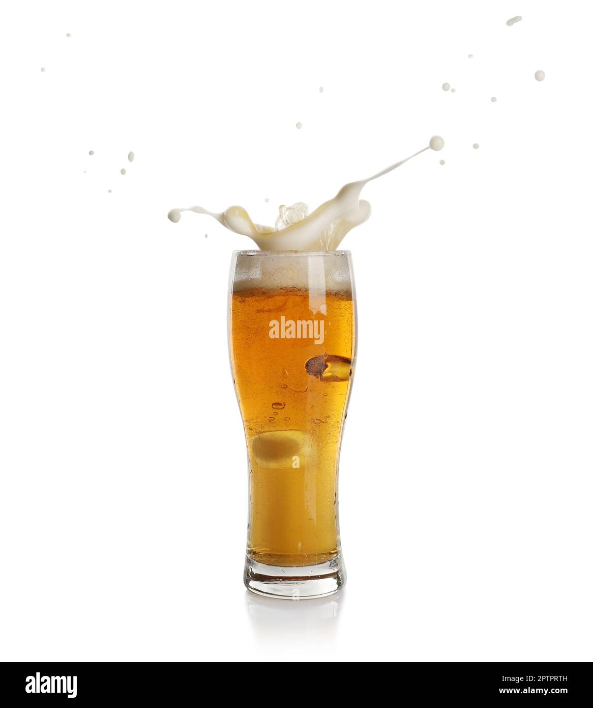 Beer splashing out of glass on white background Stock Photo - Alamy