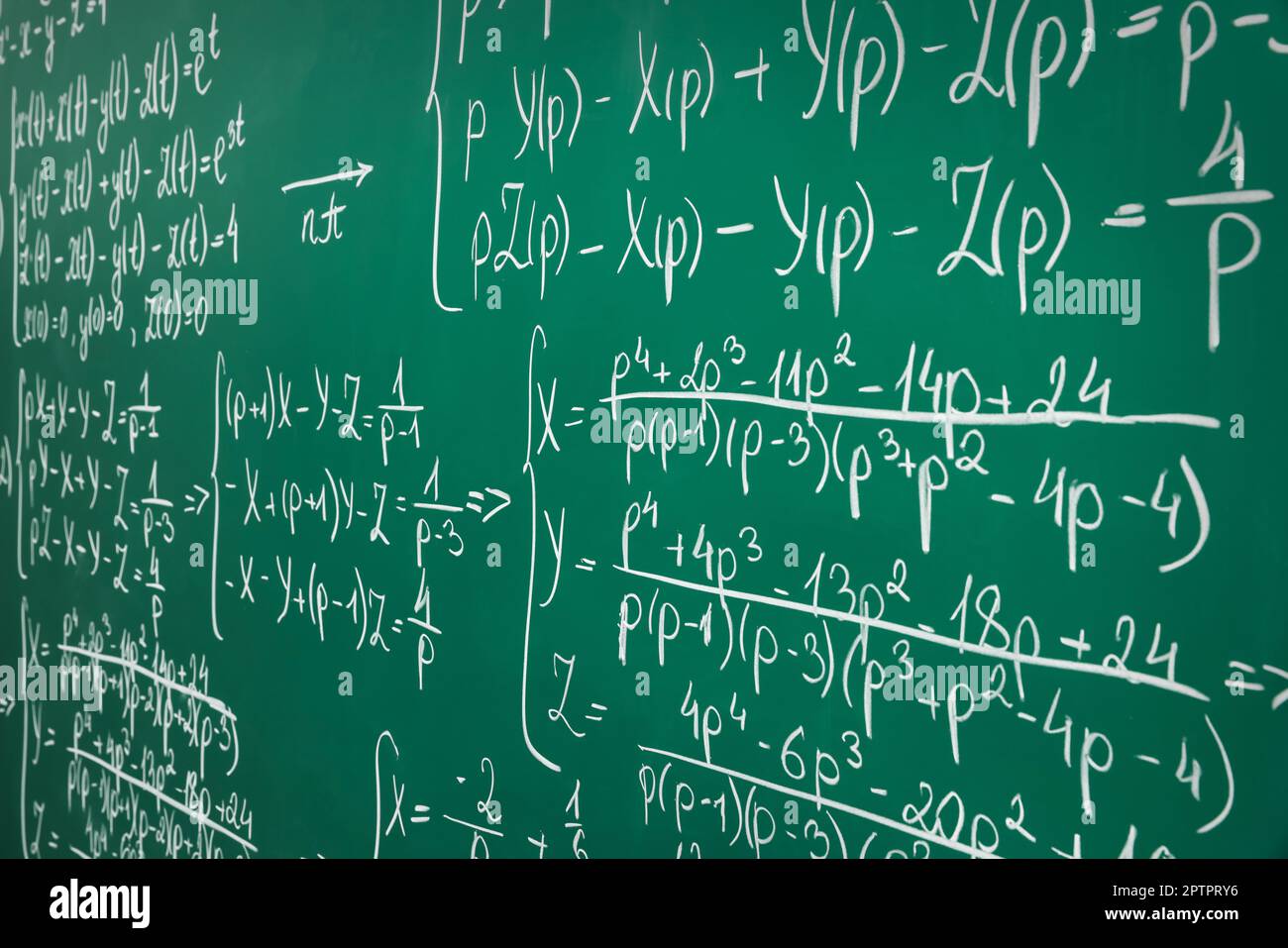Many different math formulas written on chalkboard Stock Photo - Alamy