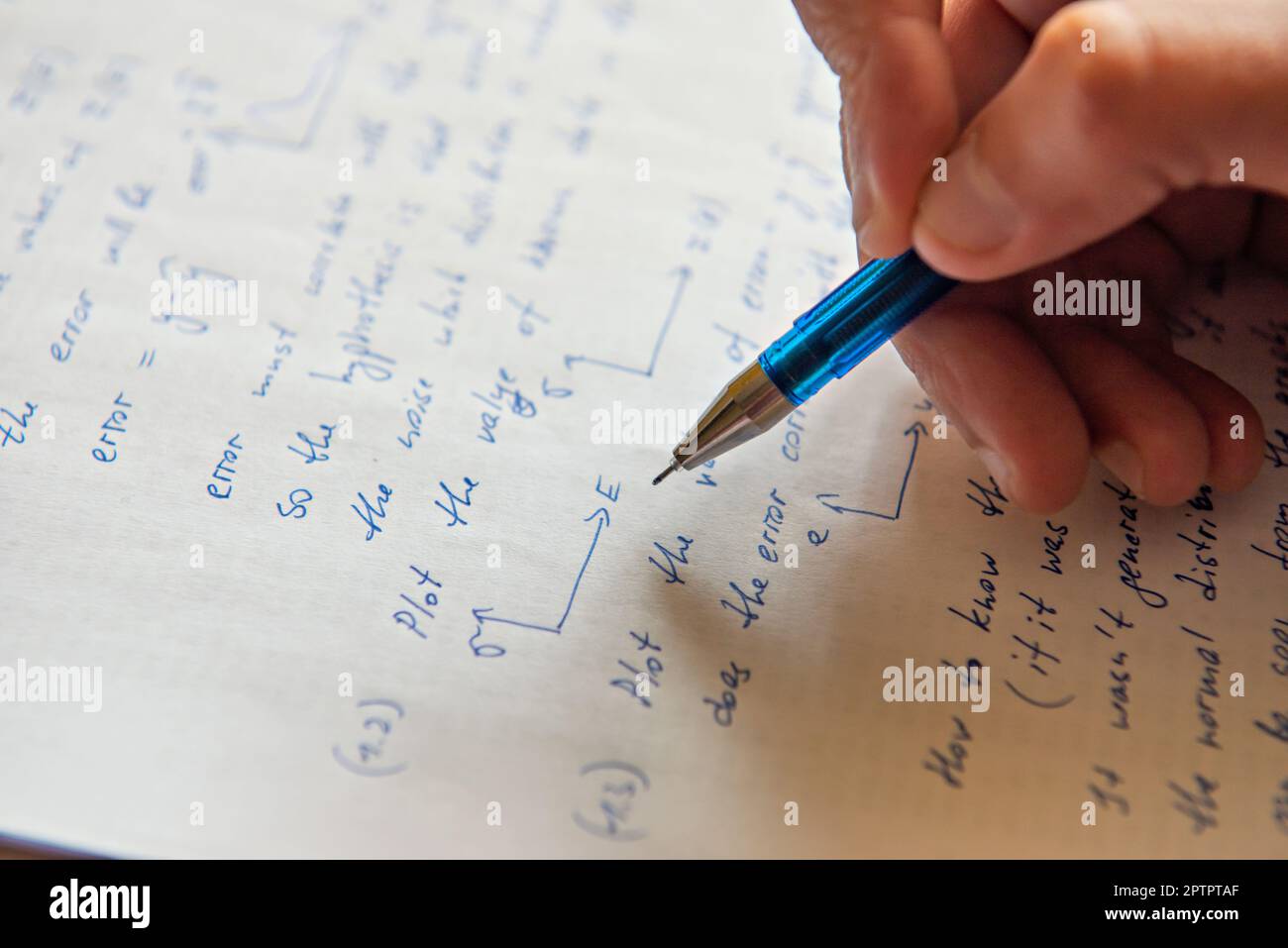 Student writing mathematical calculations on paper, closeup Stock Photo ...
