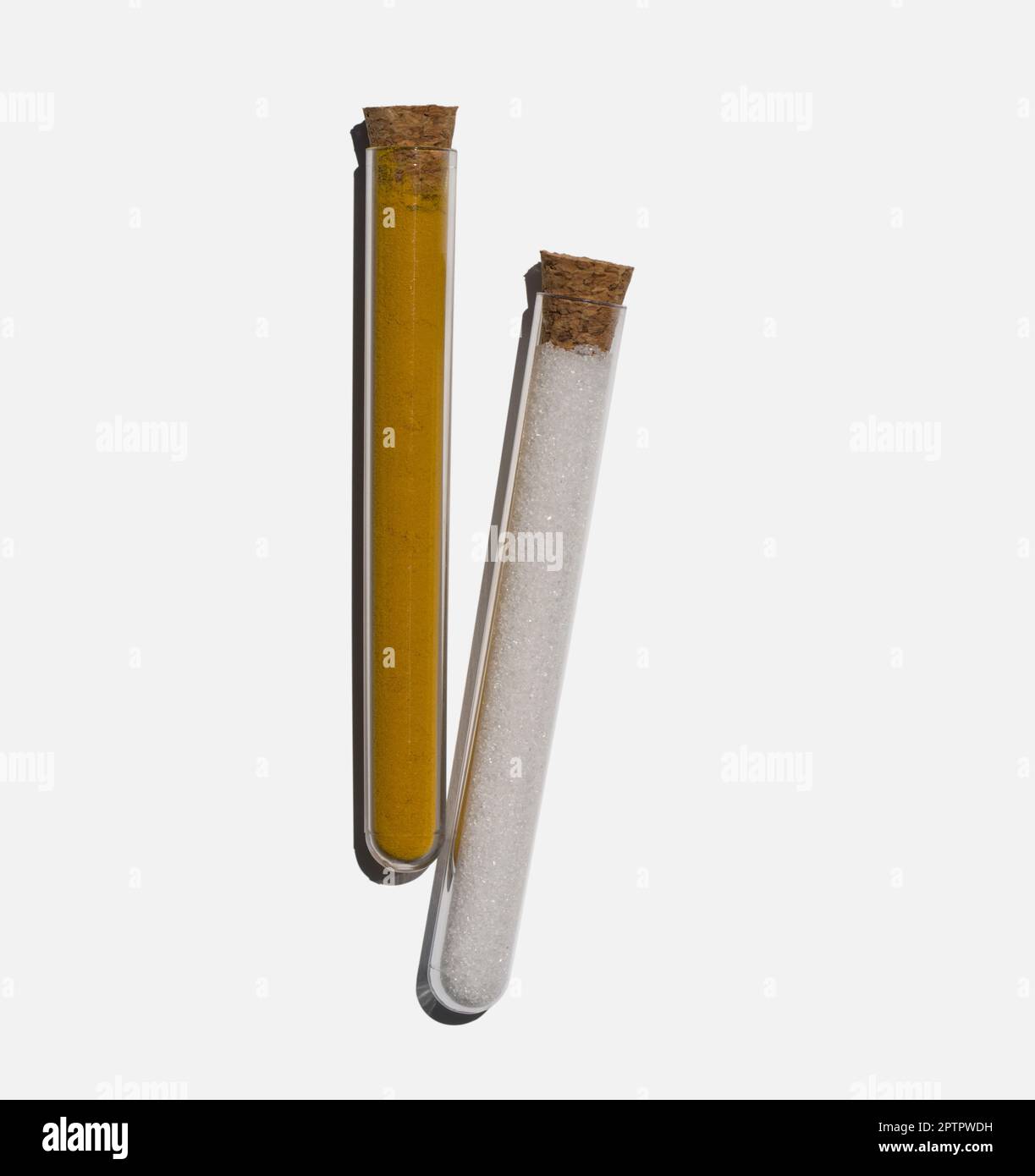 Organic Curcuma Powder and Di-Ammonium Phosphate in test tube with cork ...