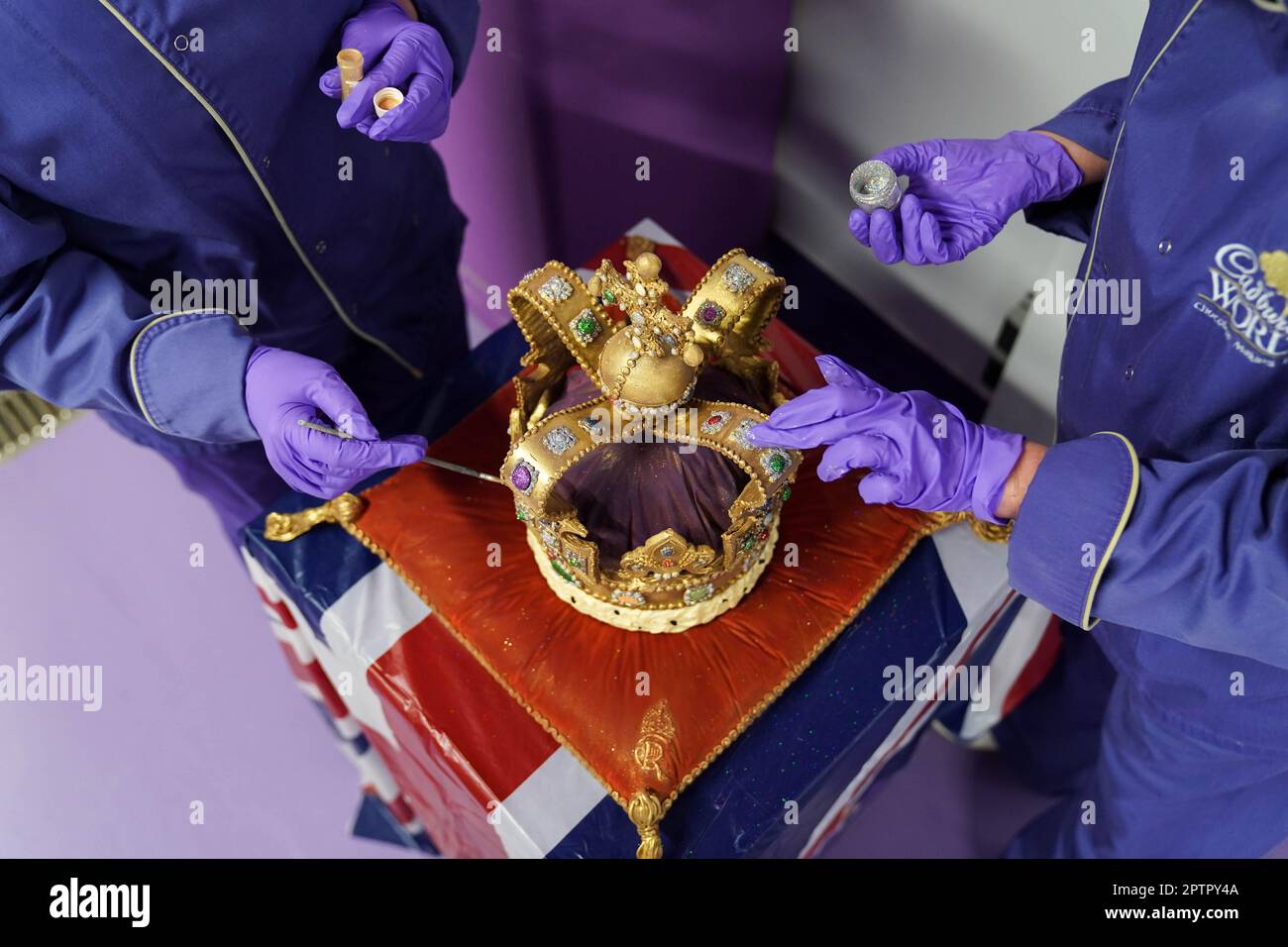 Cadbury World chocolatiers Dawn Jenks and Donna Oluban add the ...