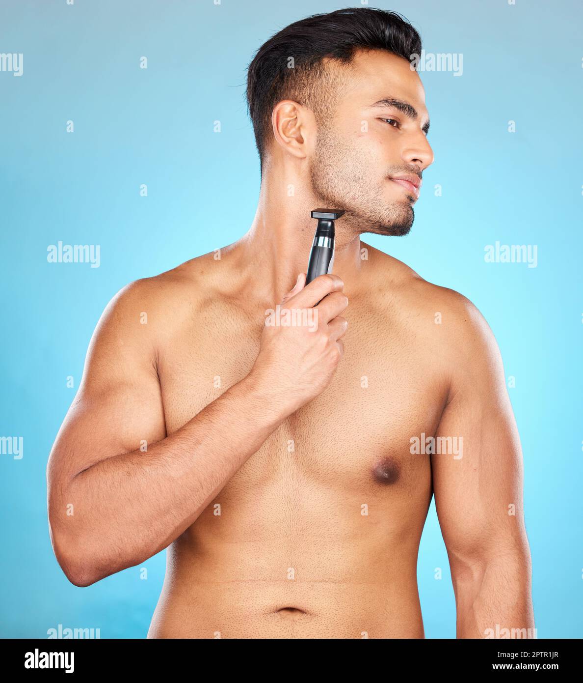 Studio, hair removal or model shaving beard or grooming his face for ...