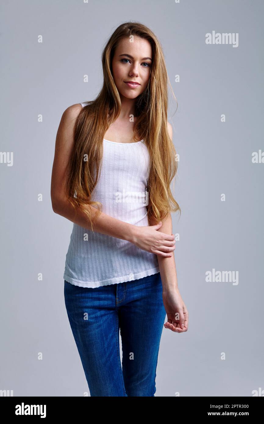 Beautiful even in the most simplest of styles. Studio portrait of a ...