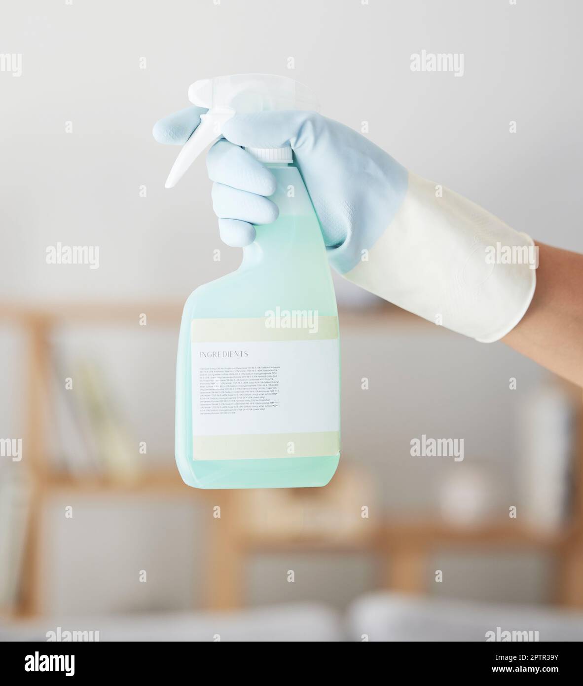 Cleaning, spray bottle and hands of woman in home for bacteria, safety ...