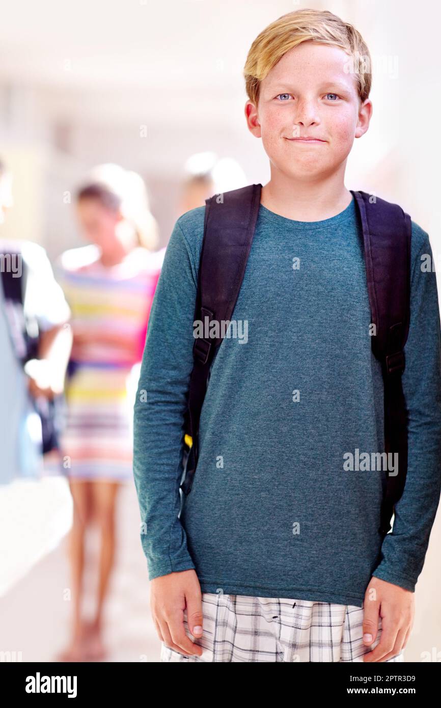 Getting the best education...Portrait of a young boy standing in a ...