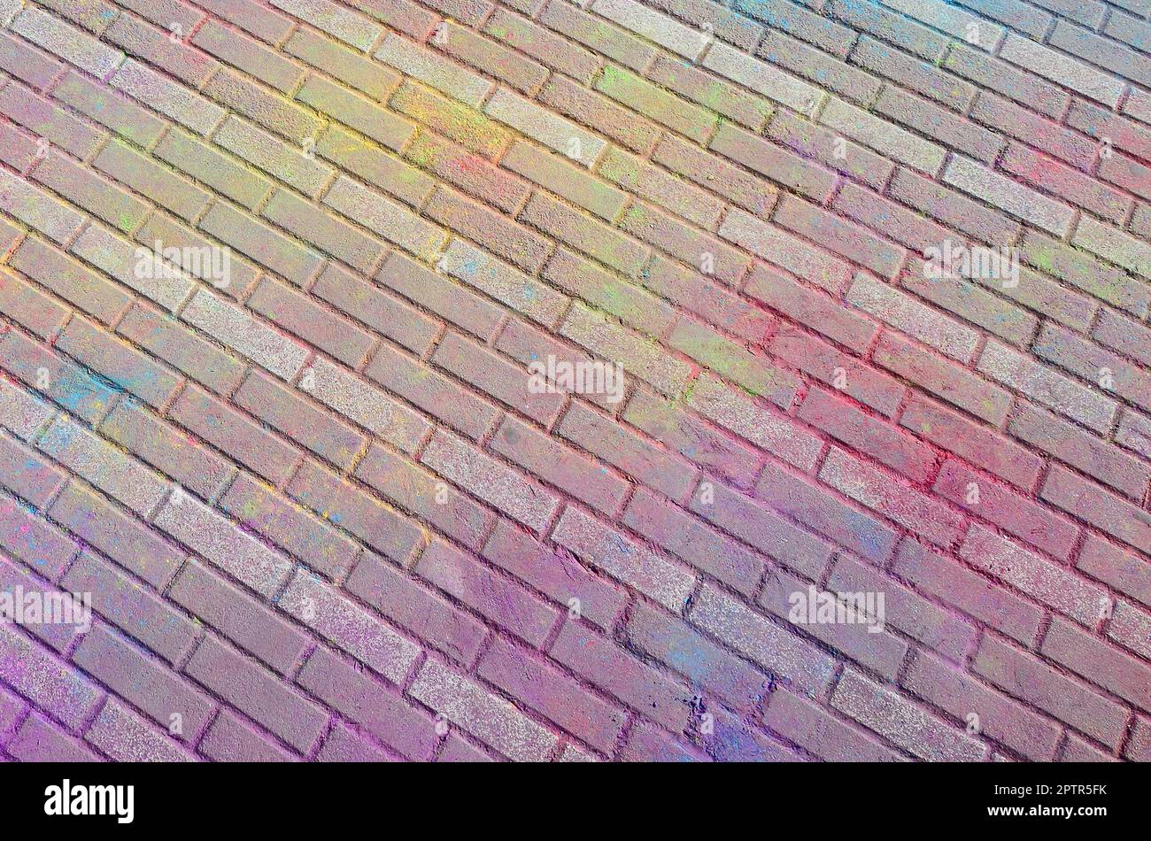 Multi colored earth, paving slabs, powder coated with dry colors at the ...
