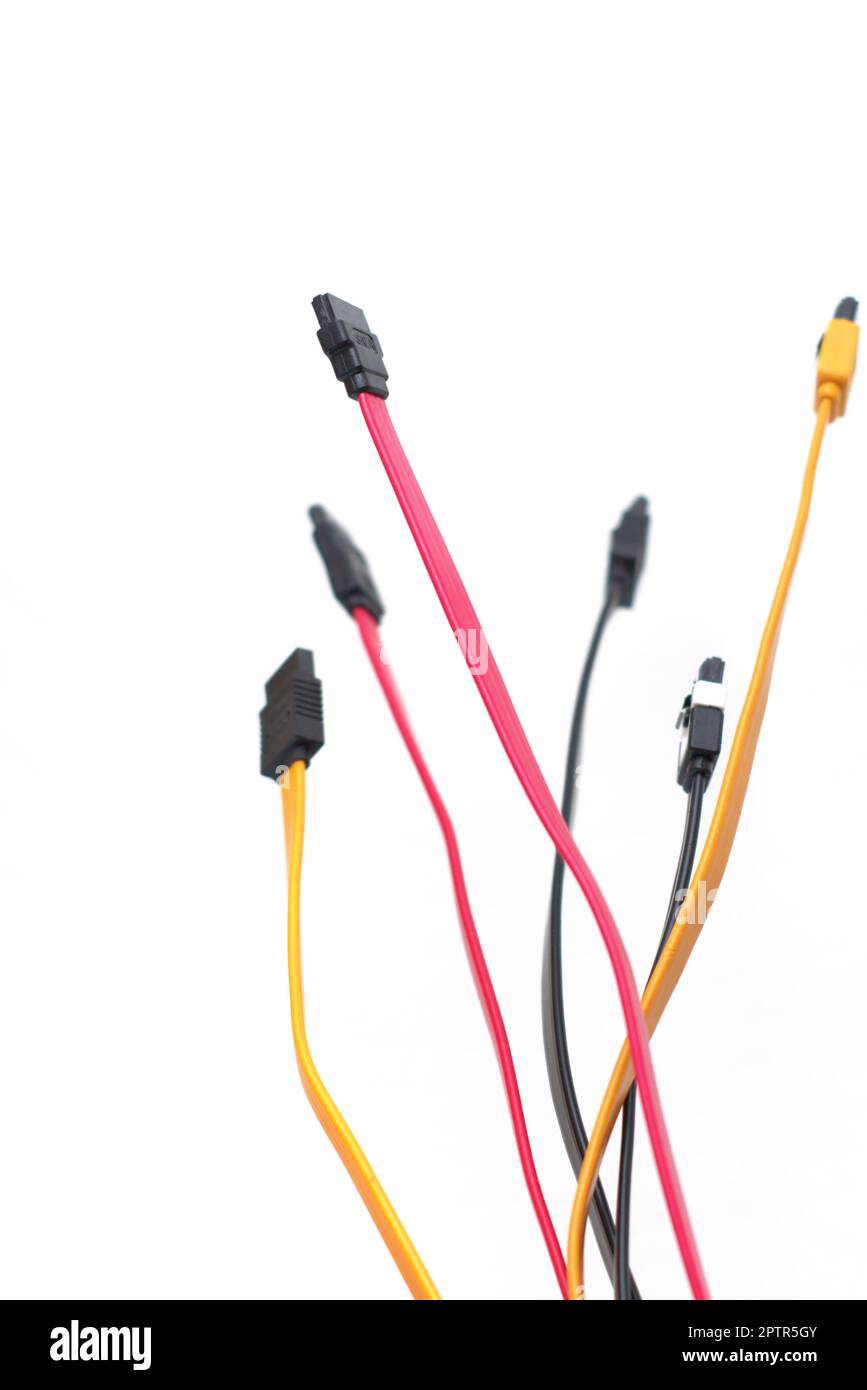 Red, black and yellow data cables on white background. Data storage ...