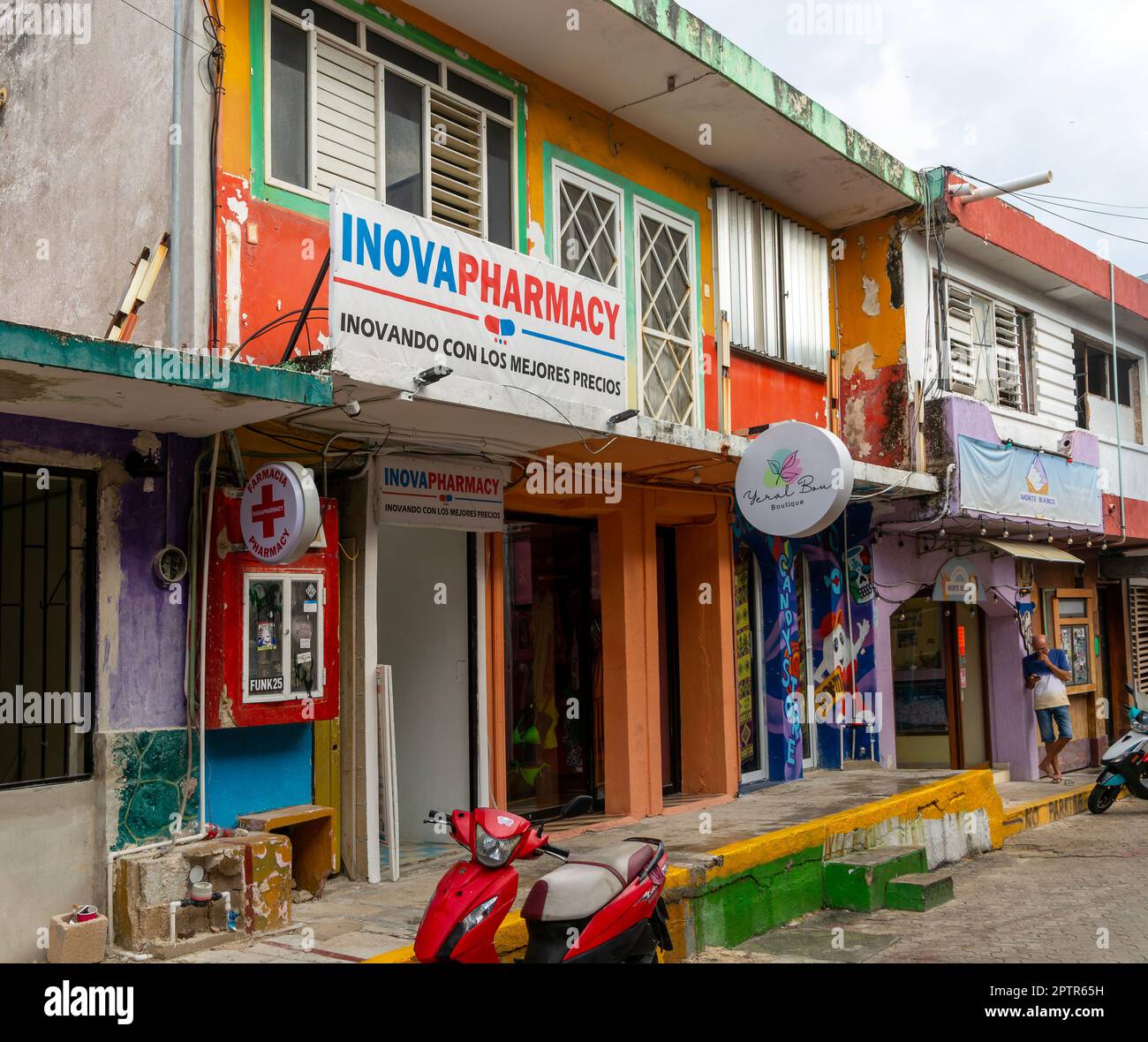Small pharmacy shop store on busy street, Isla Mujeres, Caribbean Coast ...