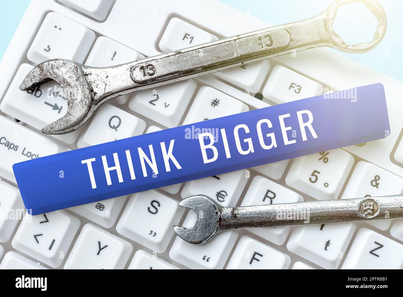 Sign displaying Think Bigger, Concept meaning being able to dream and ...