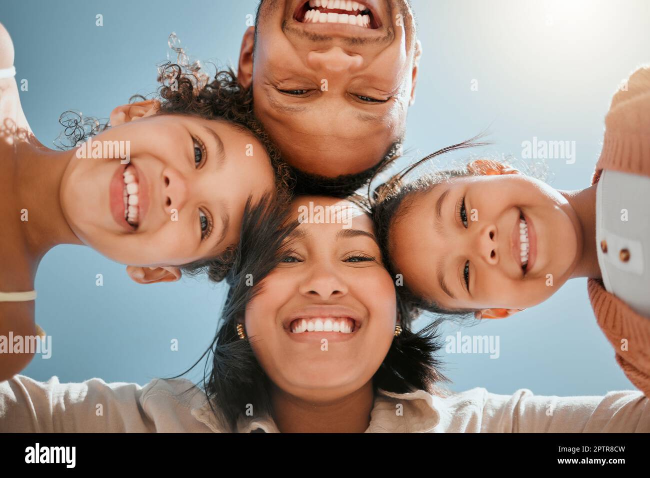 Children hugging in a circle hi-res stock photography and images - Alamy