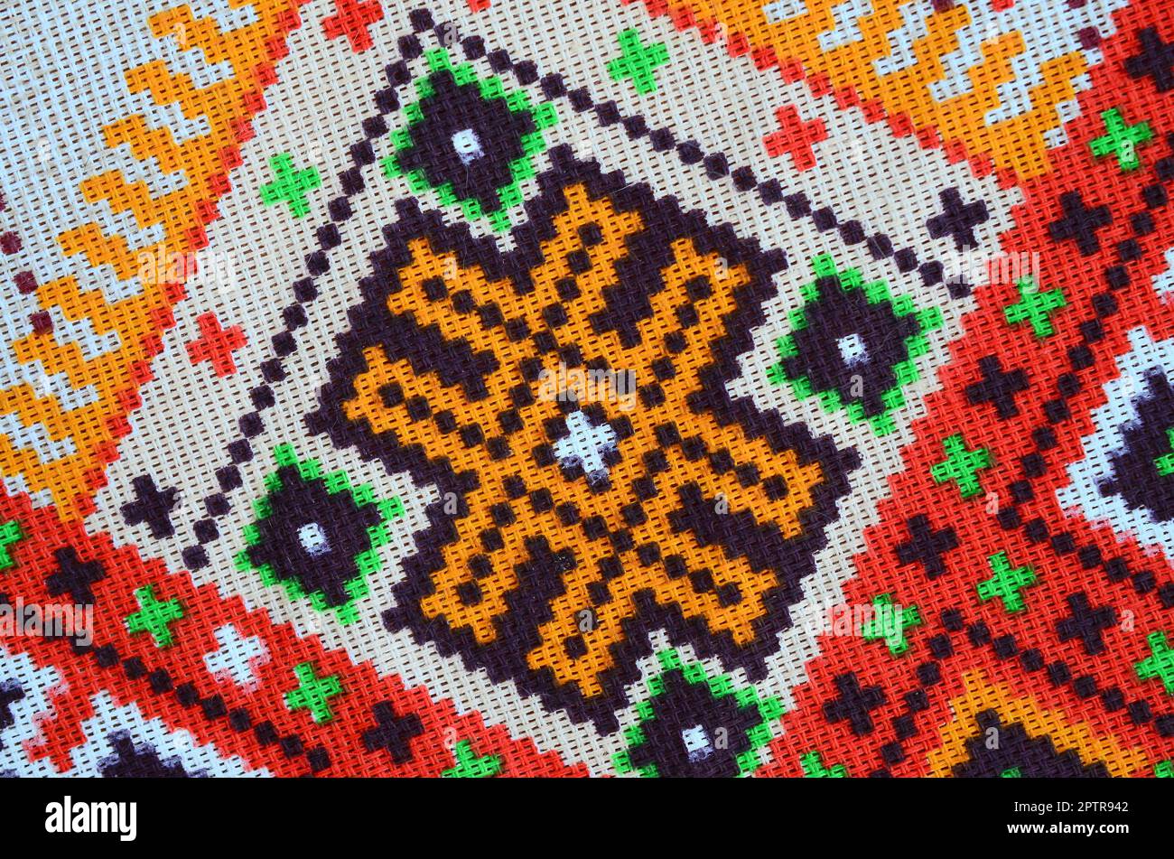 Traditional Ukrainian folk art knitted embroidery pattern on textile ...