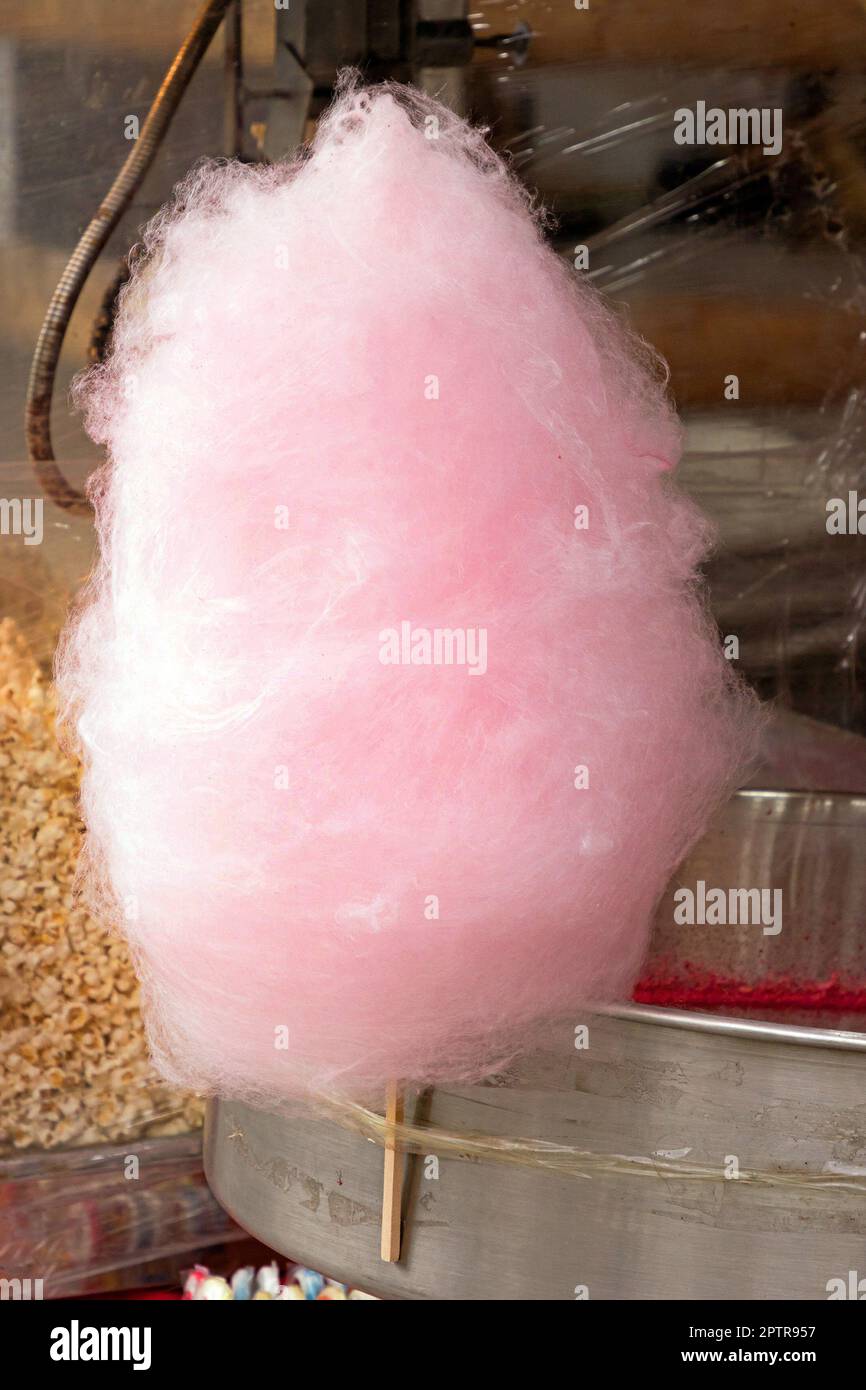 Pink cotton candy sweet sold on local market fair Stock Photo - Alamy