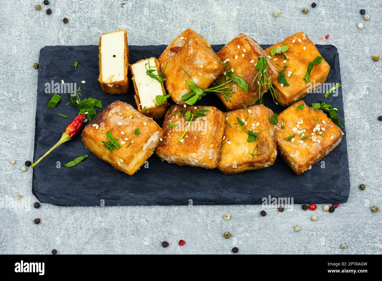Roasted tofu cheese and sesame seeds,asian vegan food. Tahu Goreng ...