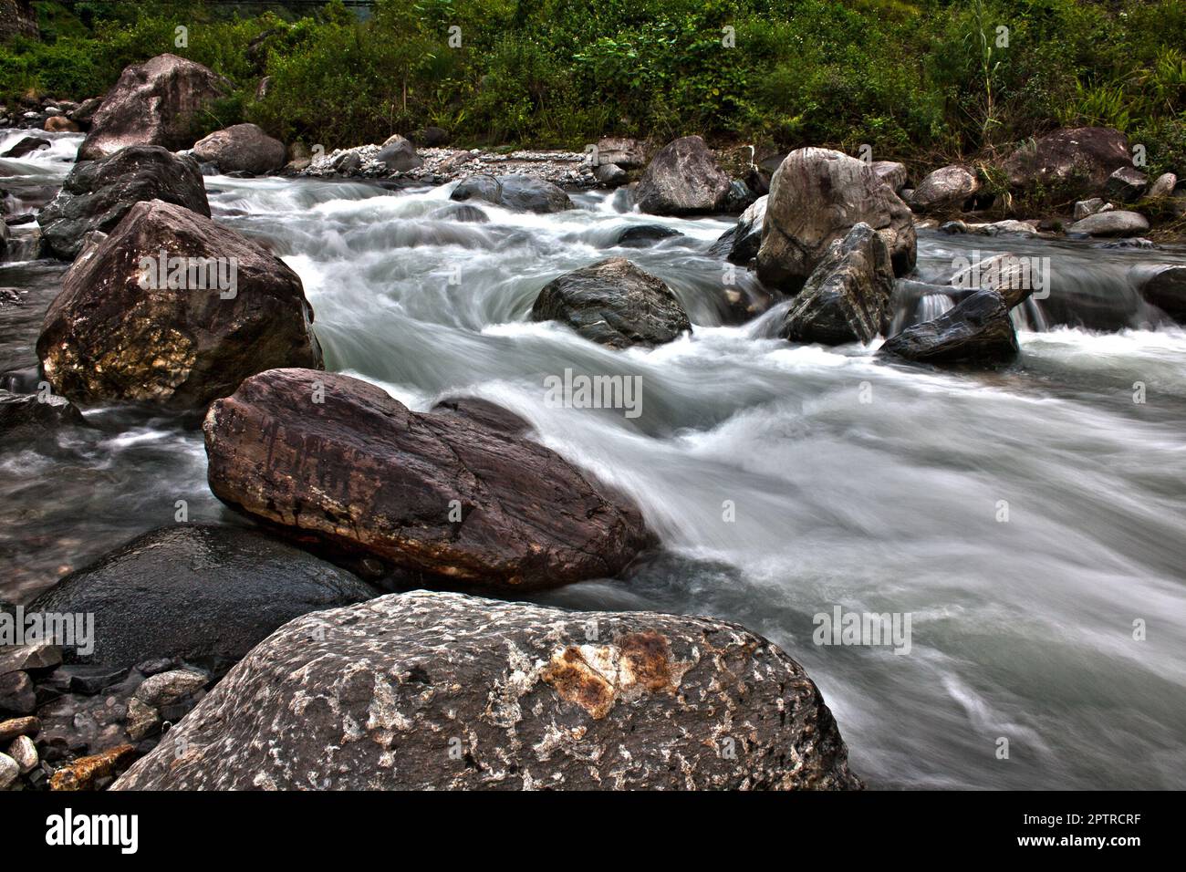 Fast flowing mountain rivers of the Himalayas Stock Photo - Alamy