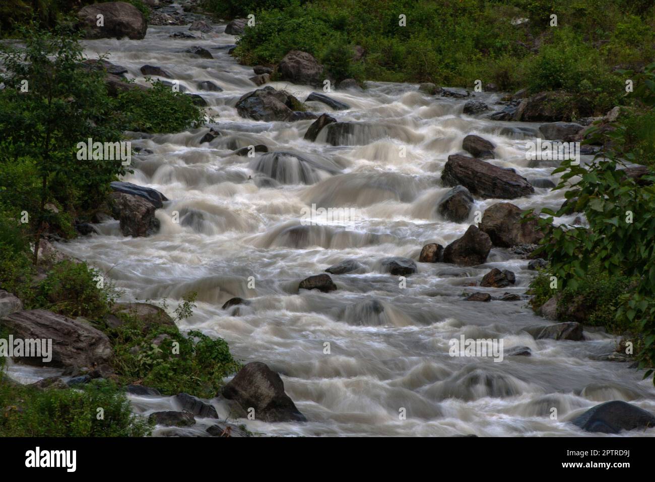 Fast flowing mountain rivers of the Himalayas Stock Photo - Alamy