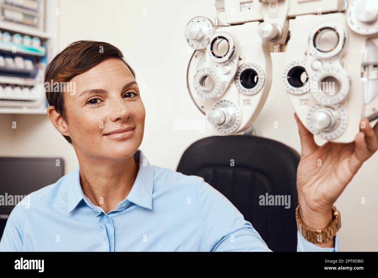 Portrait of professional optometrist, confident and happy in an ...