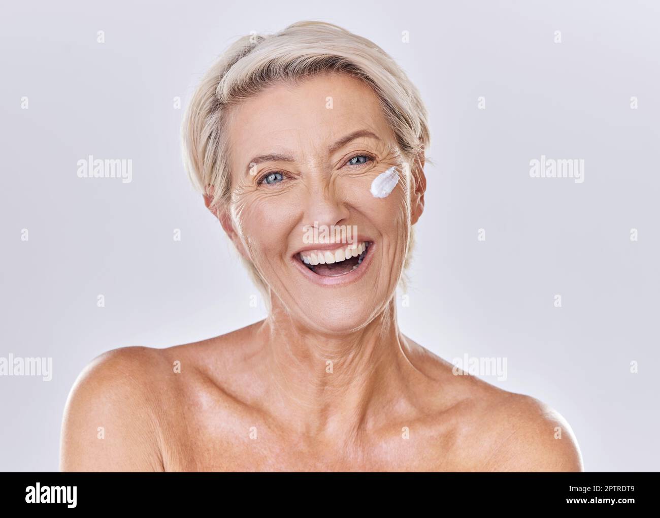 Senior woman skin care, sunscreen and face wash or cream on skin with ...