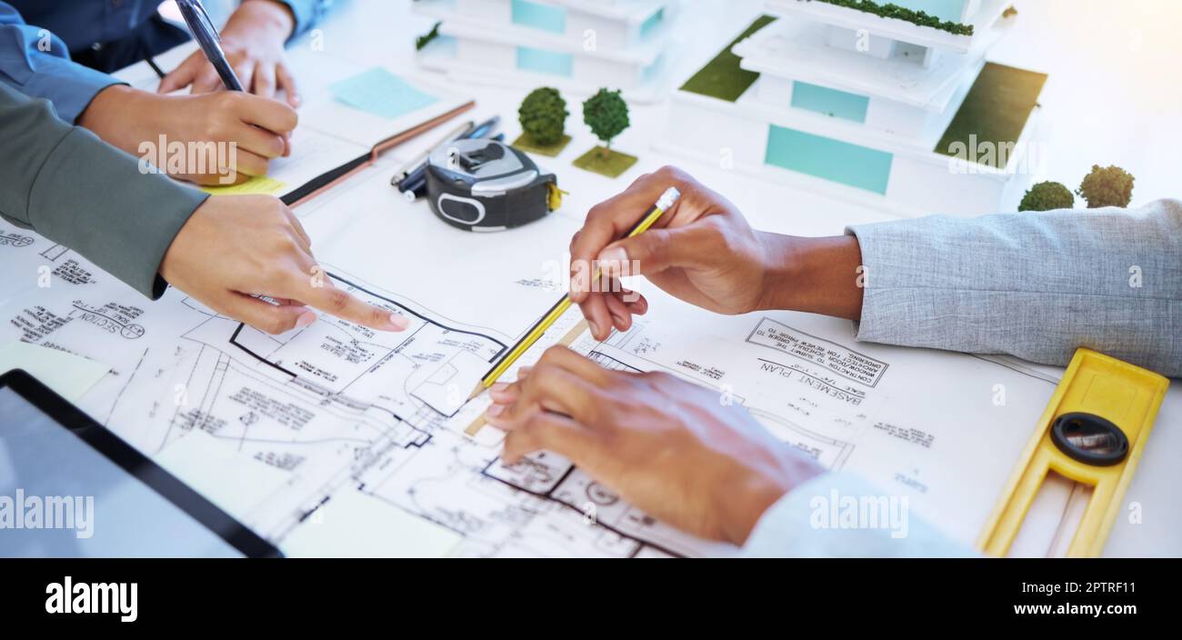 Architect hands working on architecture design, blueprint or floor plan ...
