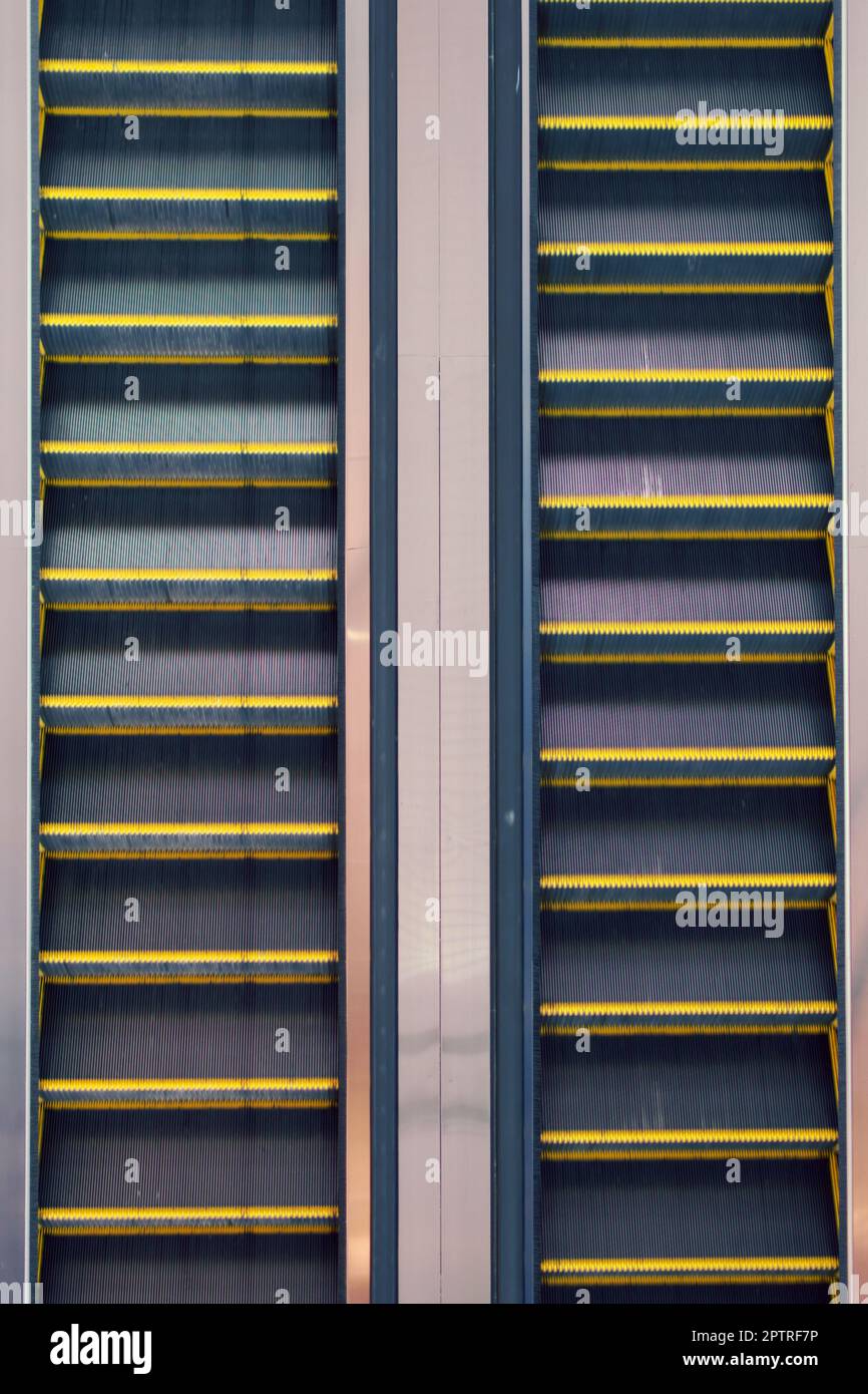 Parallel steel escalators at an airport, top-down elevated view Stock ...