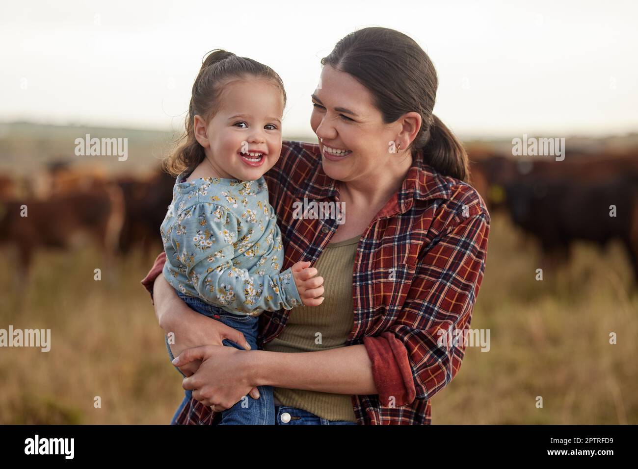 Farmer hugging daughter in field hi-res stock photography and images - Alamy