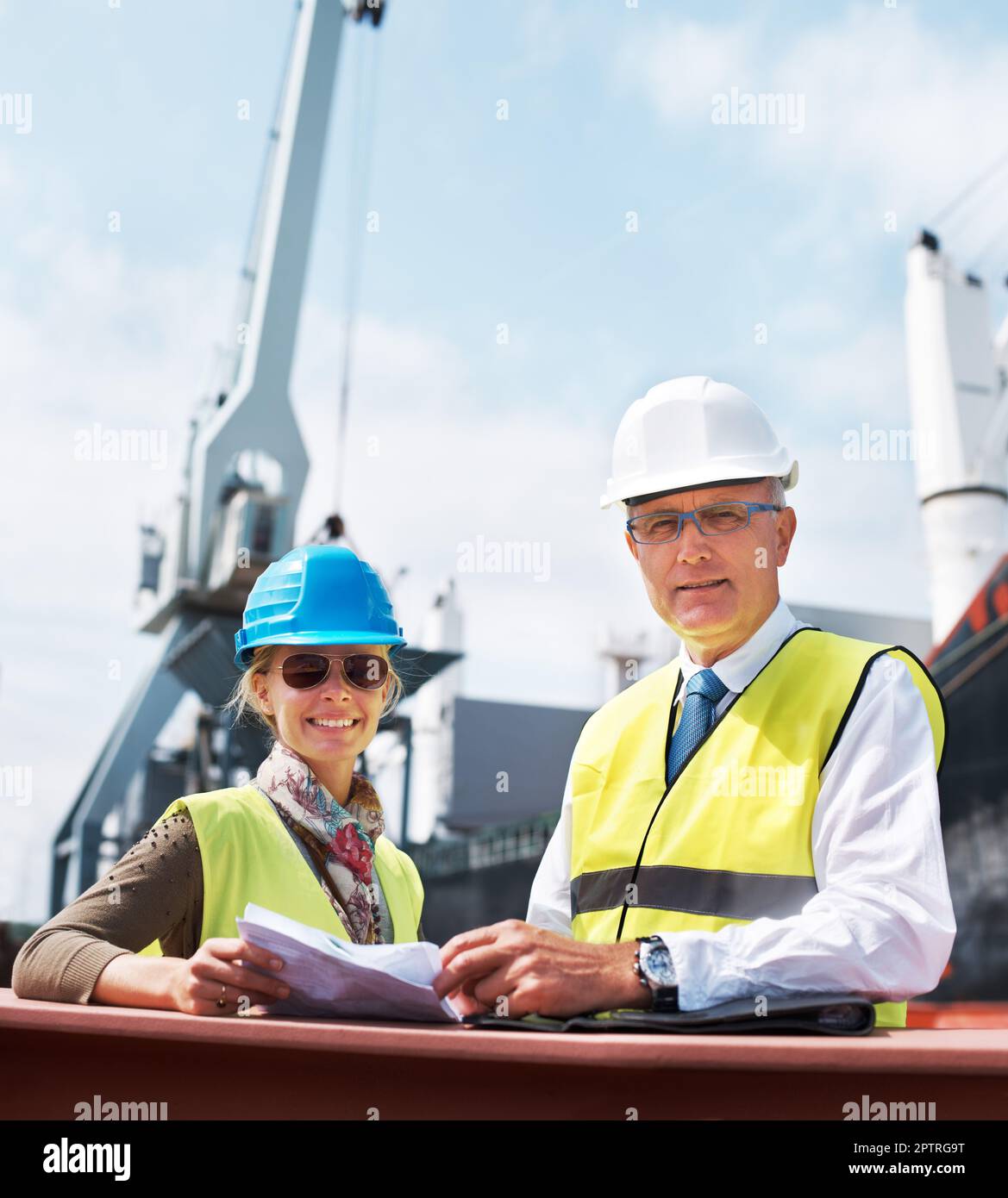 Ship engineer team planning in a meeting on the dock talking about ...