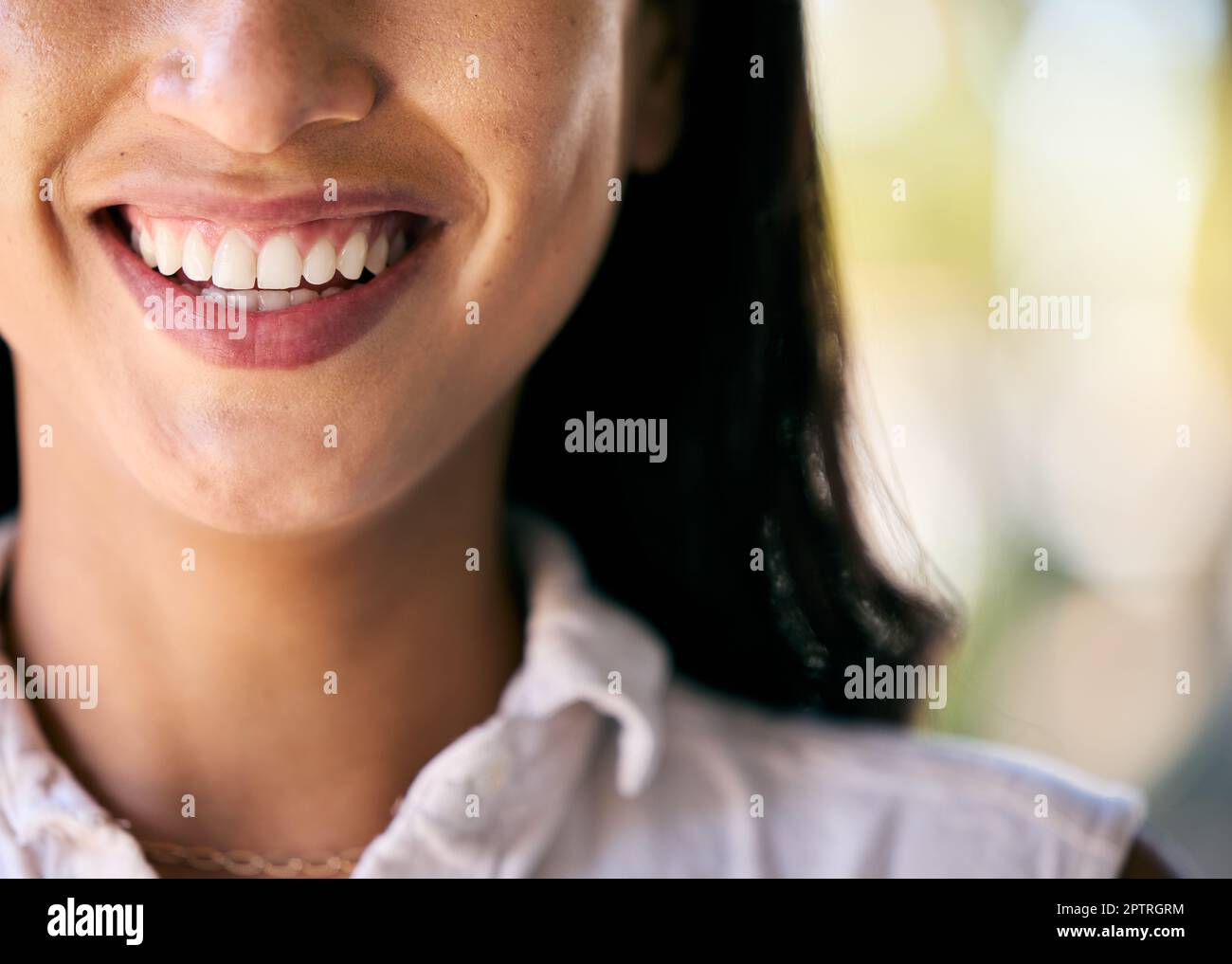 Mouth, teeth and happy with a black woman smiling alone outdoor during ...
