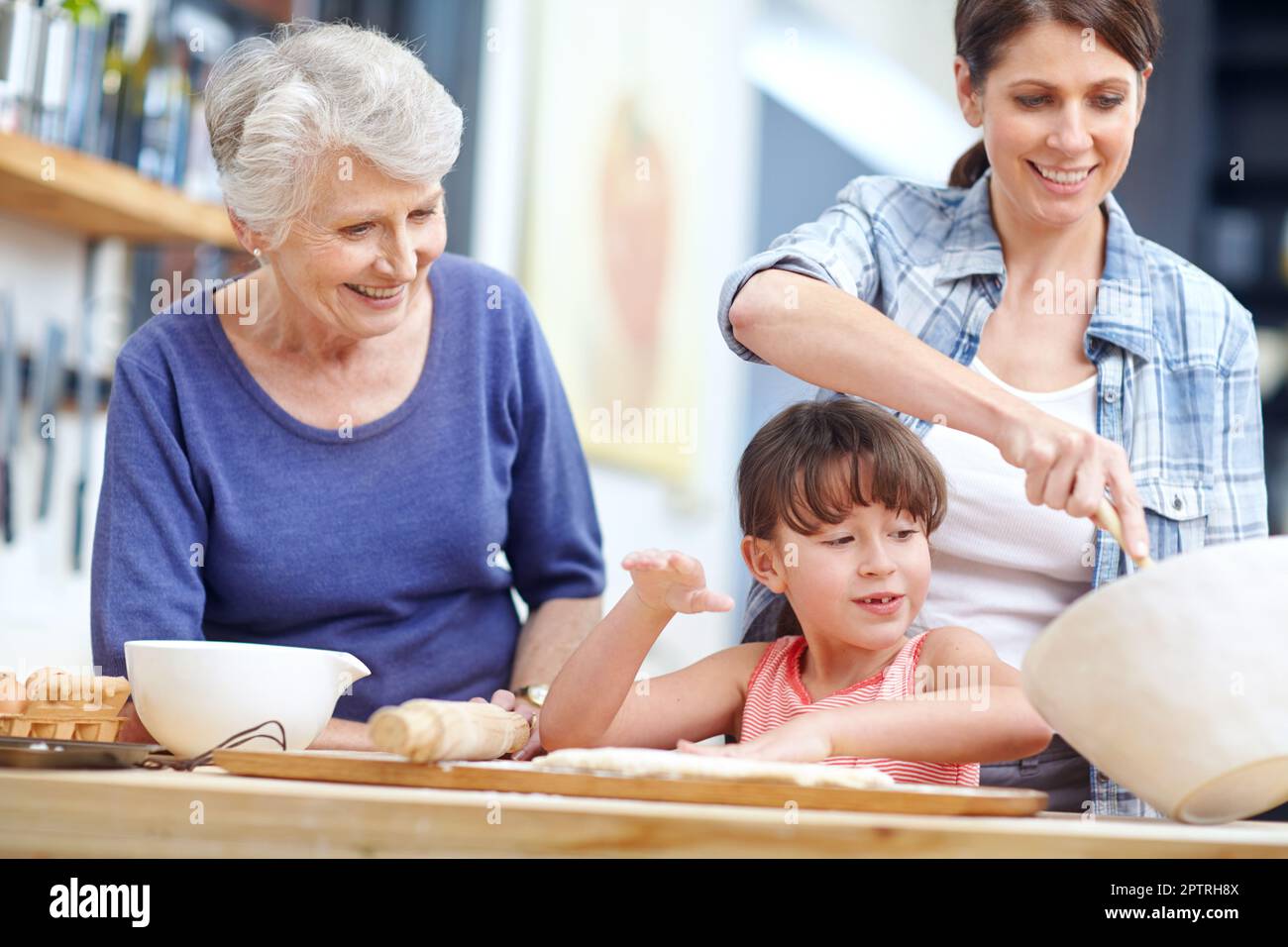 Do more of what you love. a three generational family baking together ...