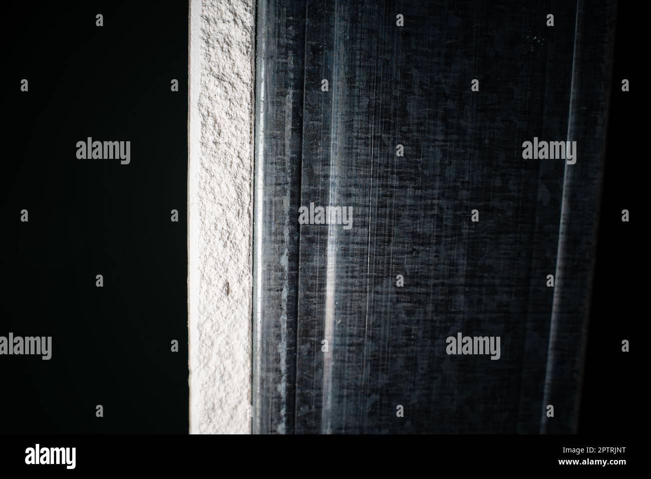 Moisture-resistant drywall adheres tightly to the metal profile close ...