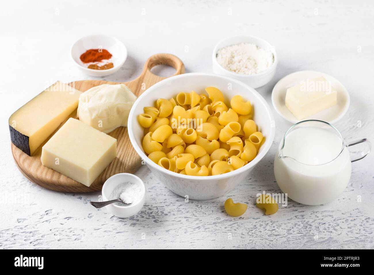 Ingredients for making American pasta: pasta, three types of cheese ...