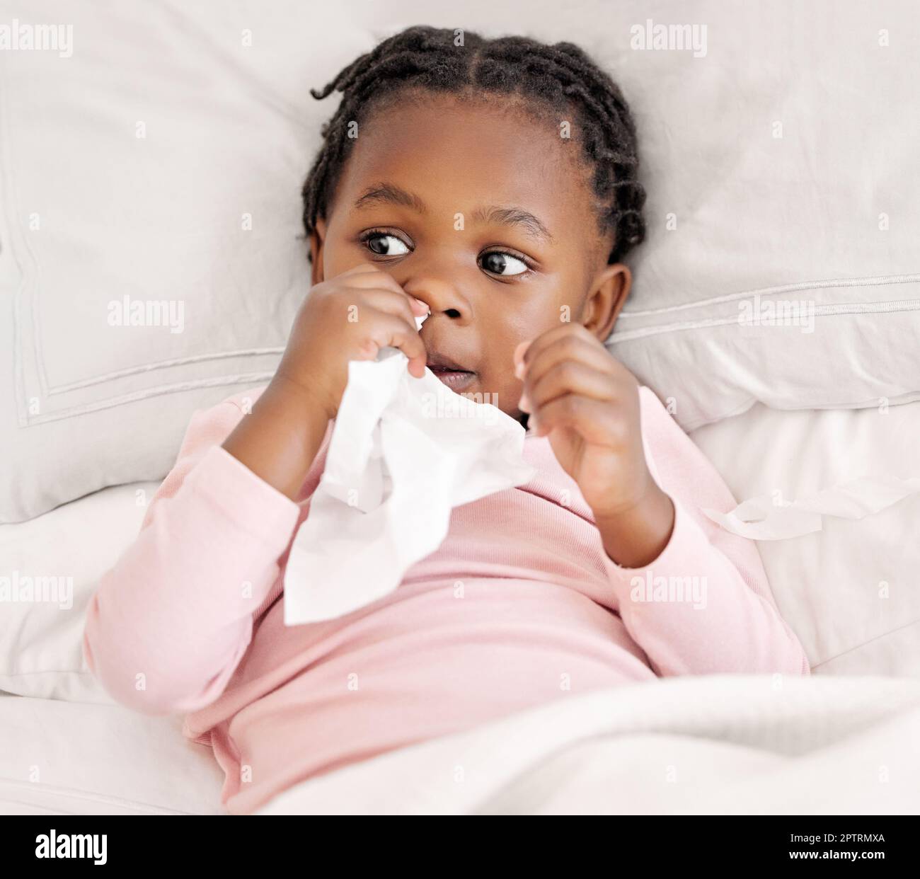 Child in bed looking cold hi-res stock photography and images - Alamy