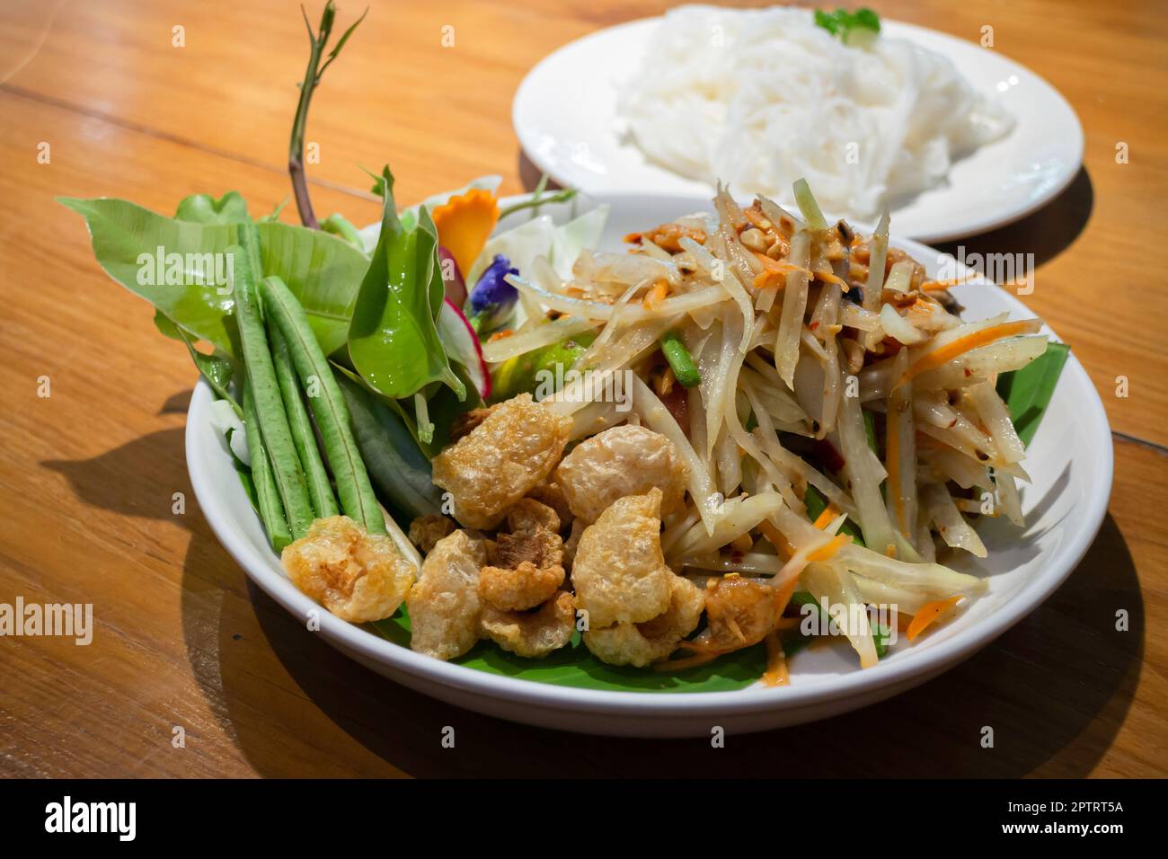 Spicy green papaya salad dish, stock photo Stock Photo - Alamy